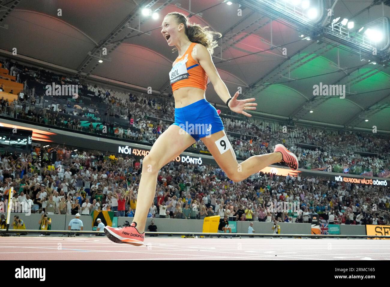 Femke Bol, of the Netherlands crosses the line to win the final of the ...