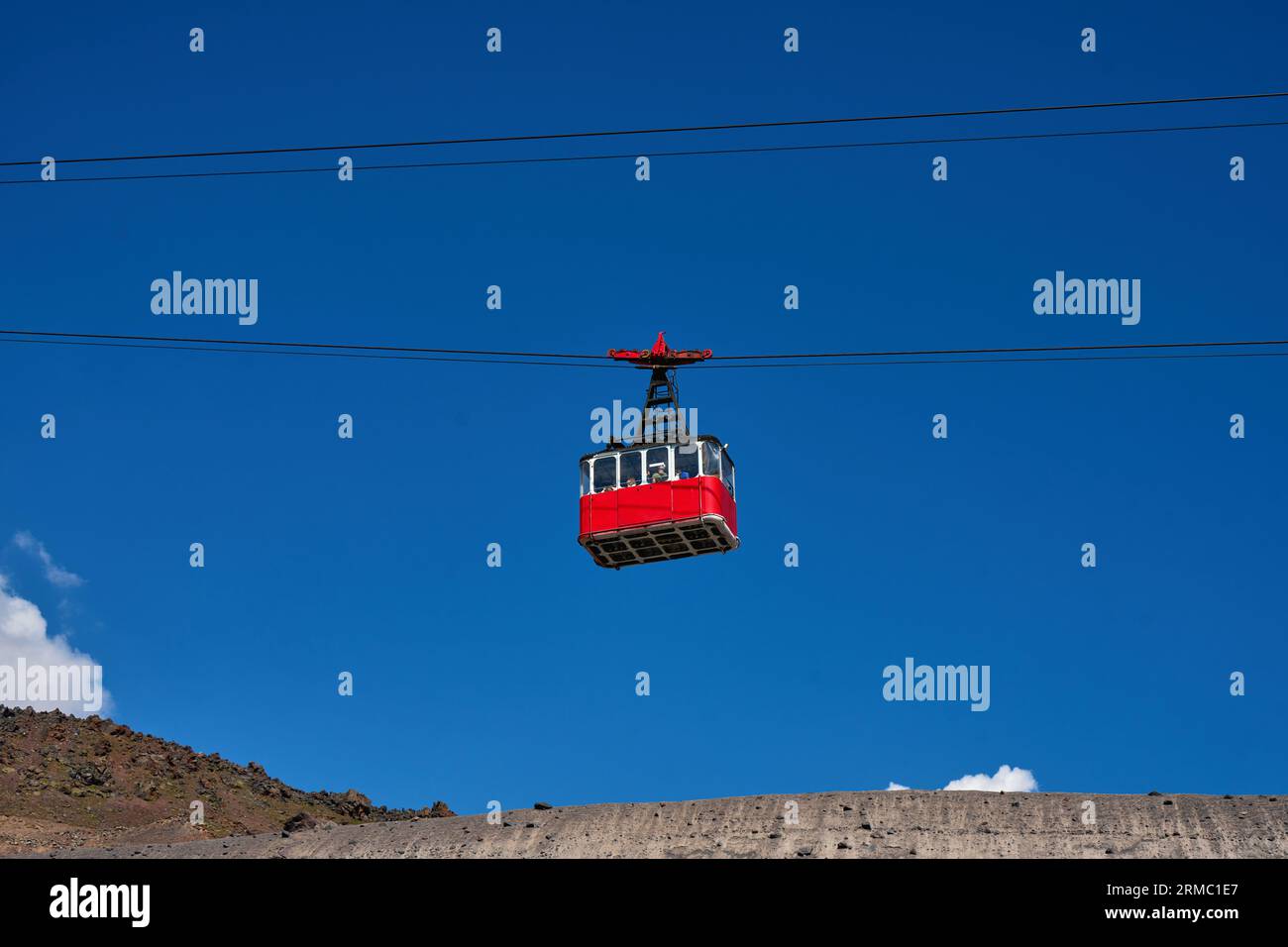 old red cable car on the background of mountains Stock Photo - Alamy