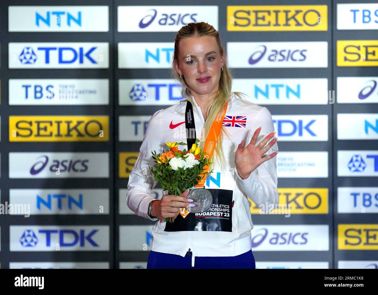 Great Britain's Keely Hodgkinson celebrates on the podium after being ...
