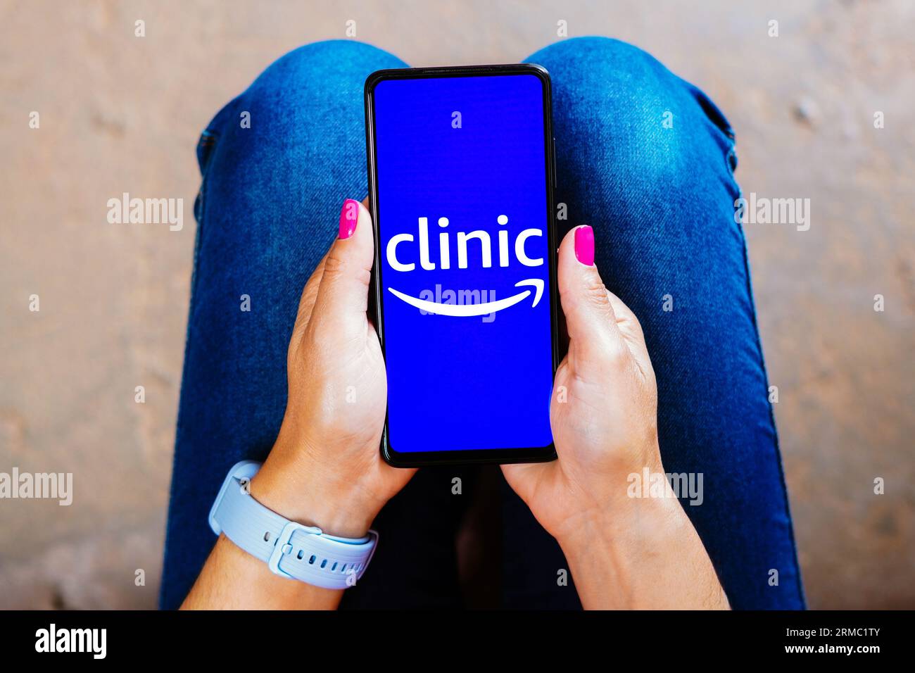 In this photo illustration, the Amazon Clinic logo seen displayed on a ...