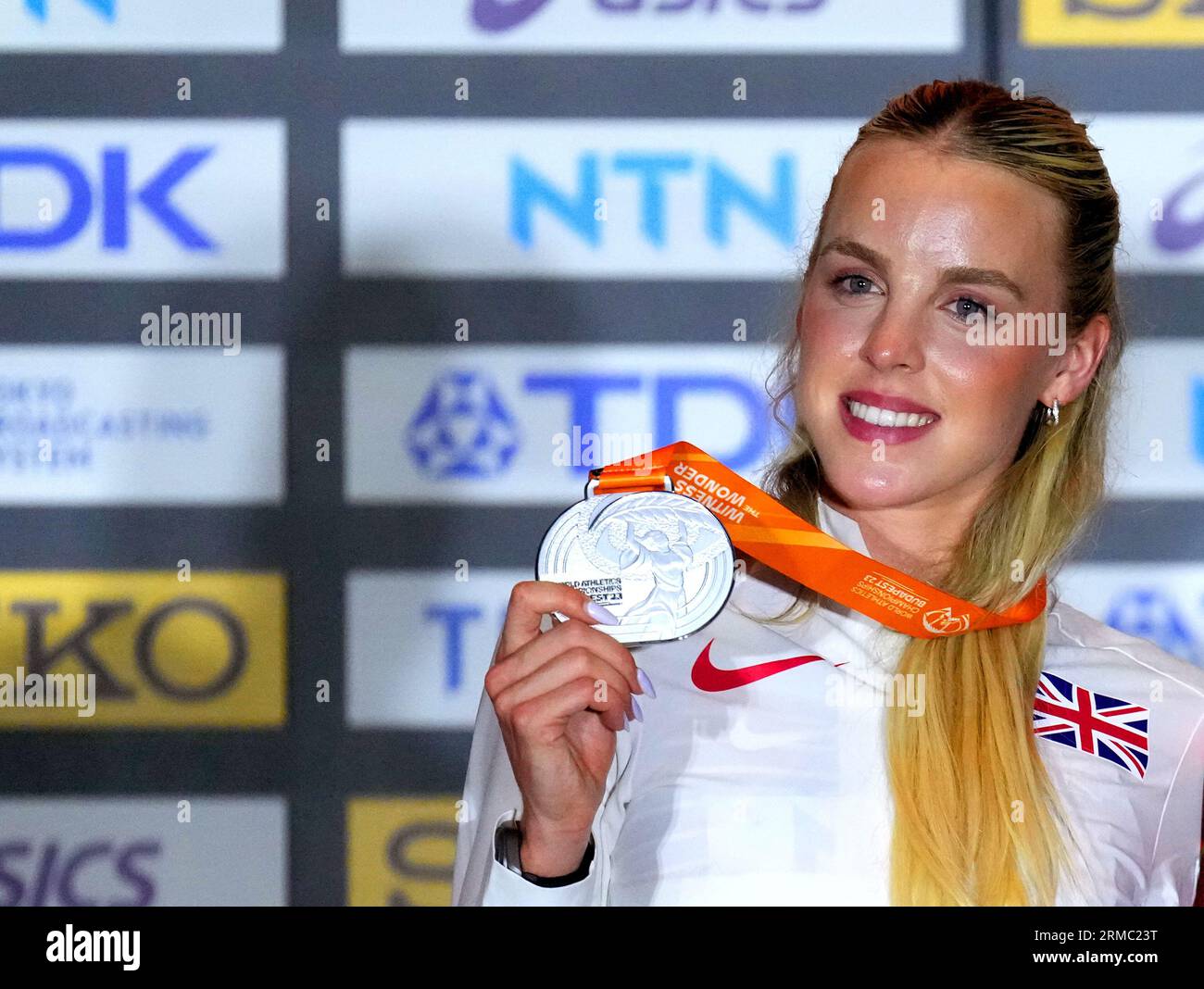Great Britain's Keely Hodgkinson celebrates on the podium after being ...