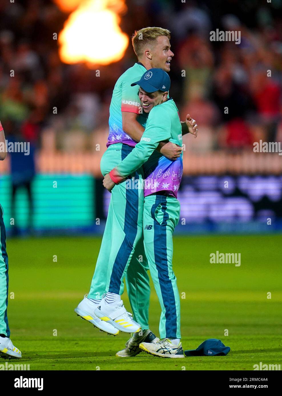 Oval Invincibles' Sam Curran (left) celebrates winning The Hundred men ...