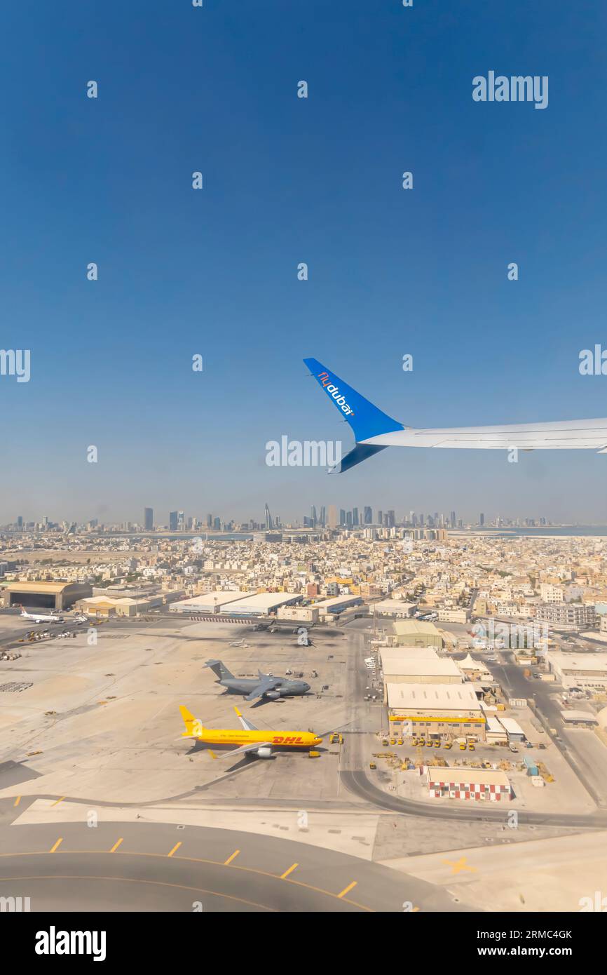 Bahrain from airplane with FlyDubai wing - view out of airplane window ...