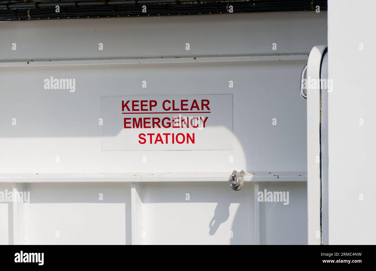 Keep Clear Emergency Station sign on cruise ship Stock Photo - Alamy