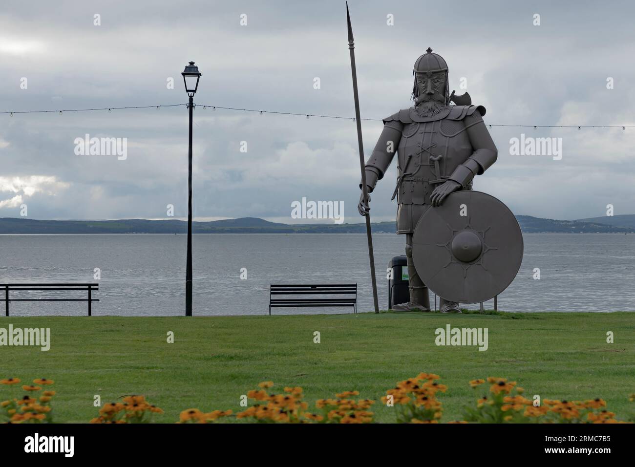 Largs, Scotland, UK - July 27th 2023 - Statue of a Viking warrior stood ...
