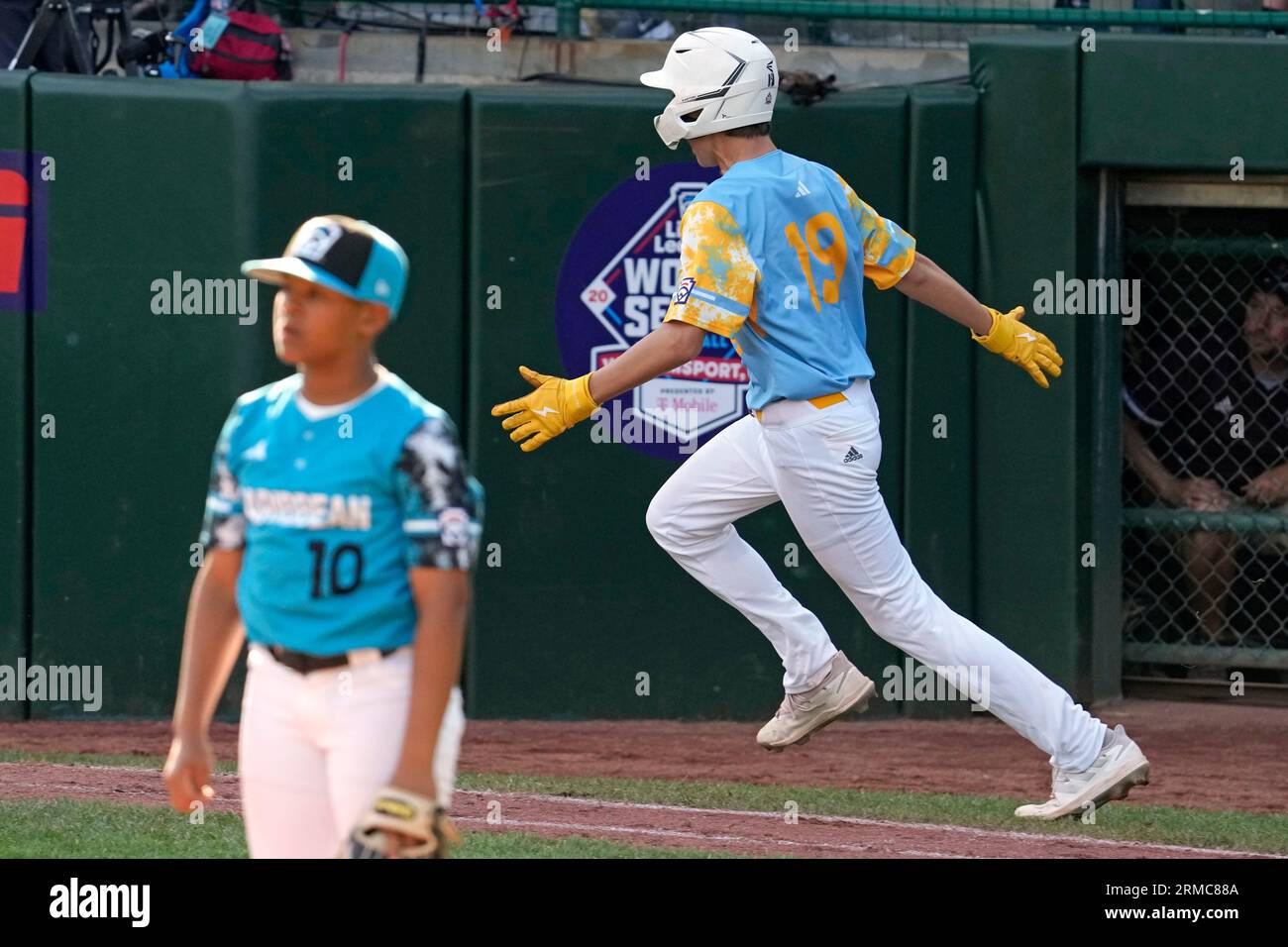 El Segundo, Calif.'s Louis Lappe (19) celebrates as he rounds first ...