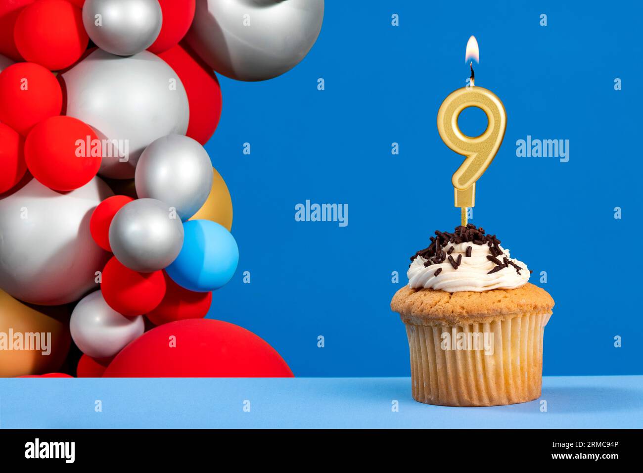 Number 9 birthday candle - Anniversary card with balloons Stock Photo ...