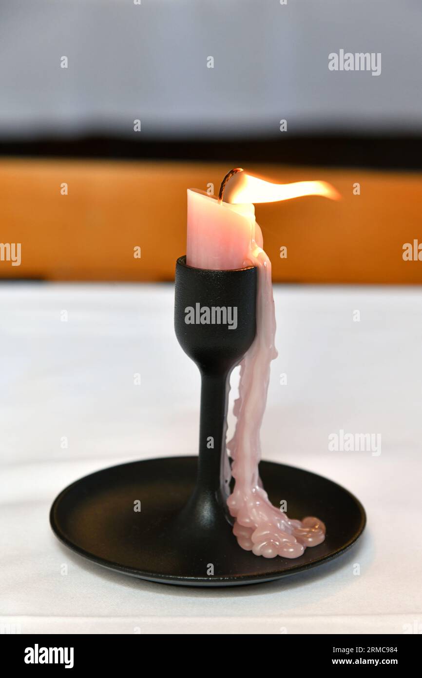 Burning candle with dripping wax hi-res stock photography and images ...