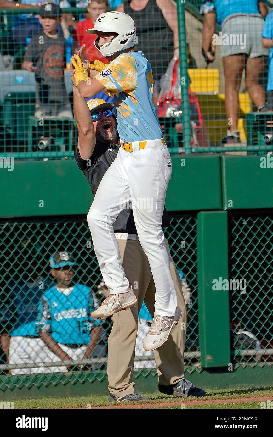 El Segundo, Calif.'s Louis Lappe (19) celebrates with coach Tim Abrams ...