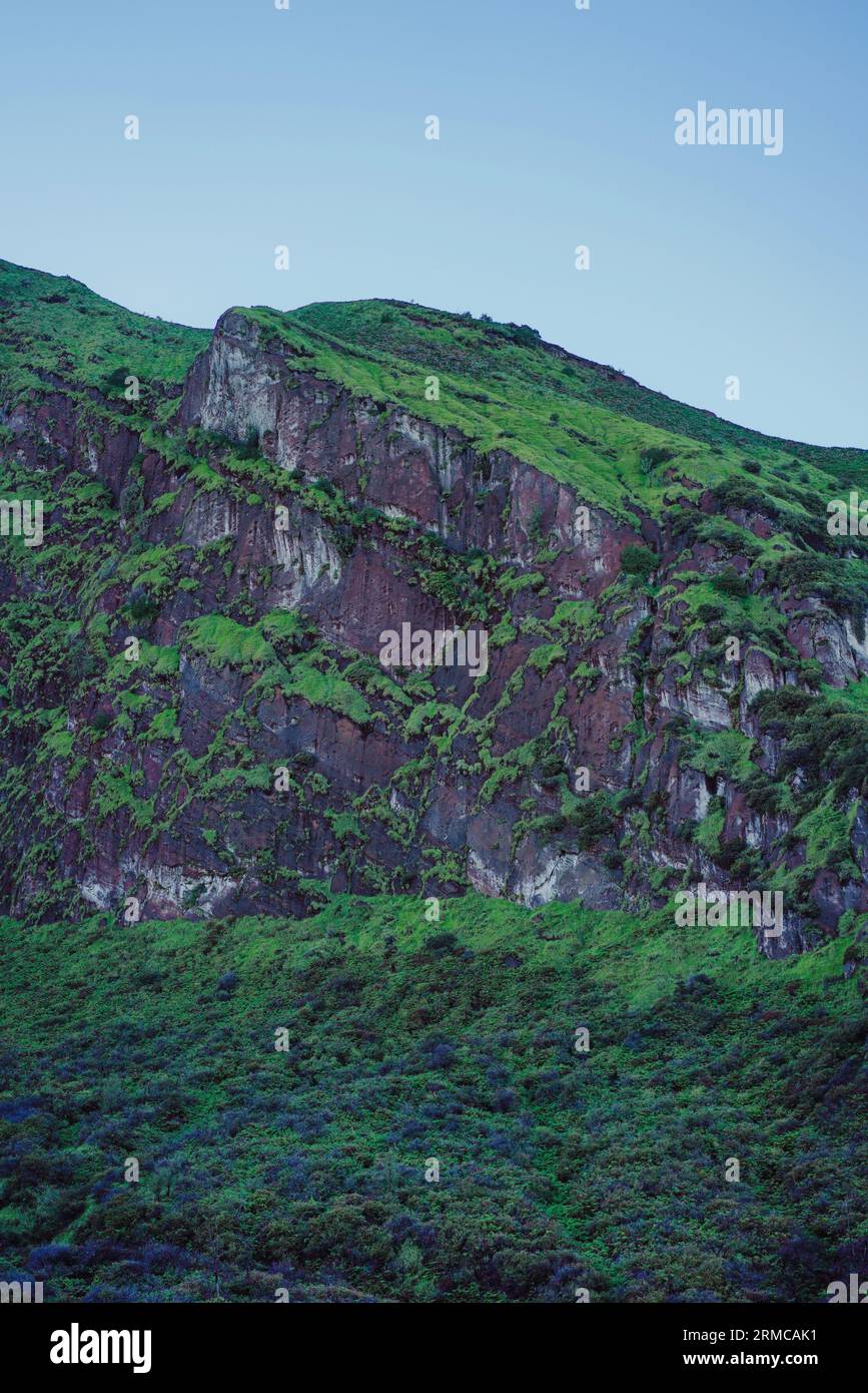 Stunning outdoor mountain landscape with lush green grass, rocky ...
