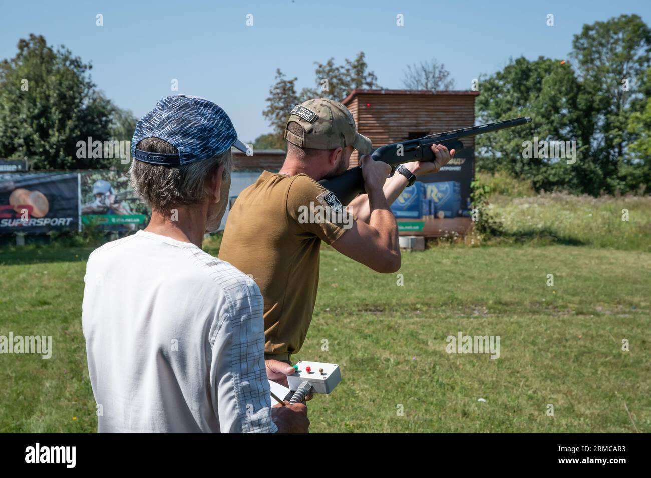 Lviv, Ukraine. 26th Aug, 2023. A military man stands with a rifle in ...
