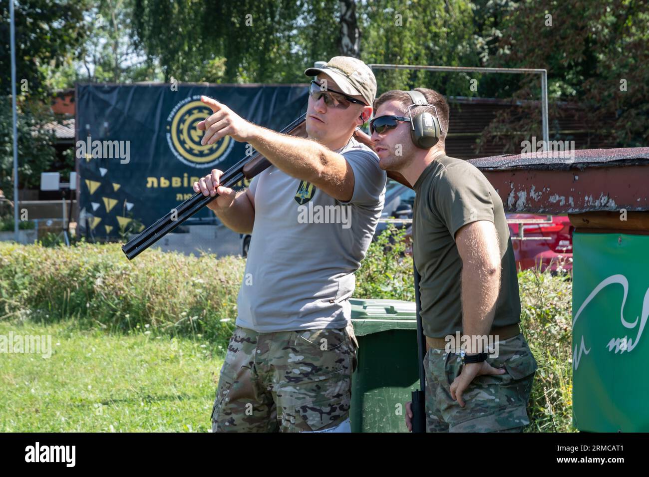 Lviv, Ukraine. 26th Aug, 2023. Military men are seen standing with ...
