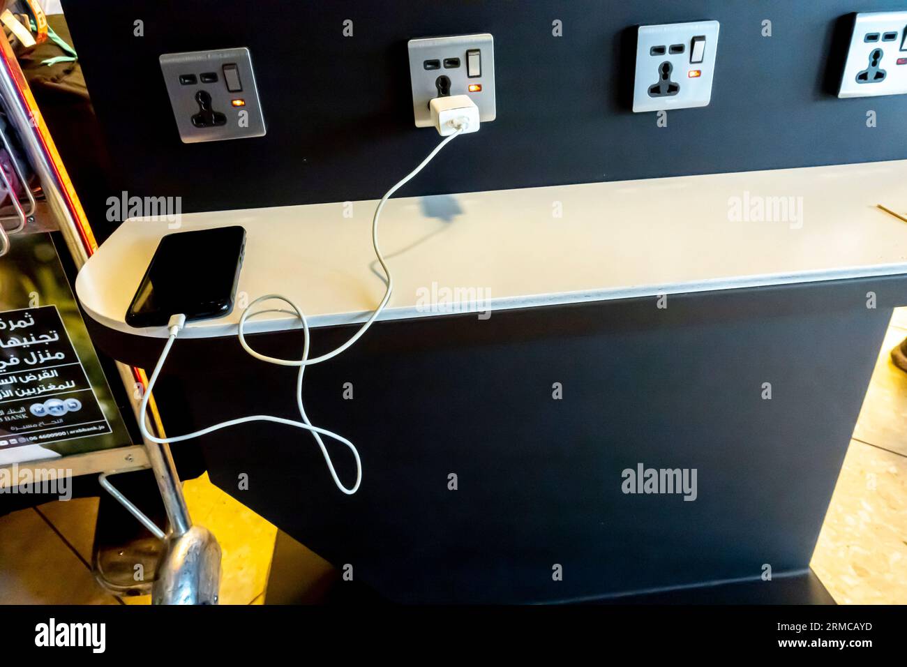 Mobile phones charging station with electric outlet. Cell phone charging, Mobile phone charging ...