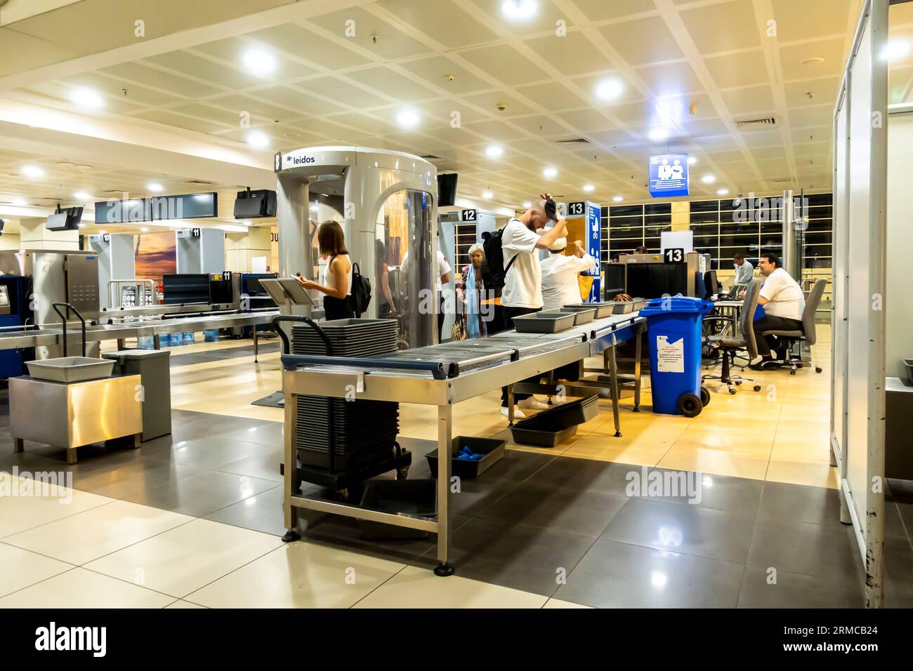 Security screening of carry-on luggage prior to the gates entrance ...