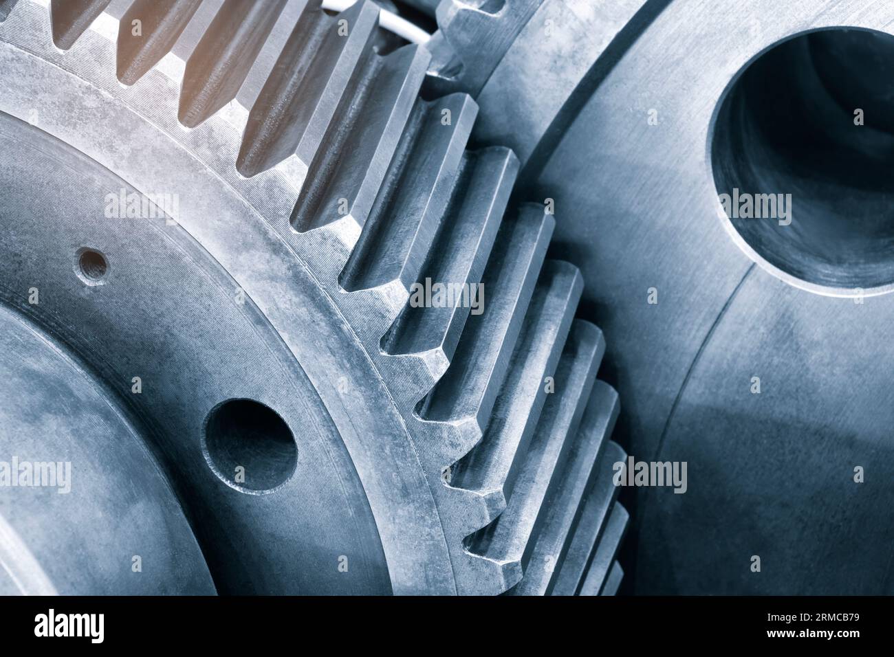Engine gear wheels, industrial background Stock Photo - Alamy