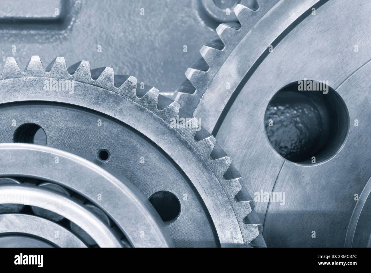 Engine gear wheels, industrial background Stock Photo - Alamy