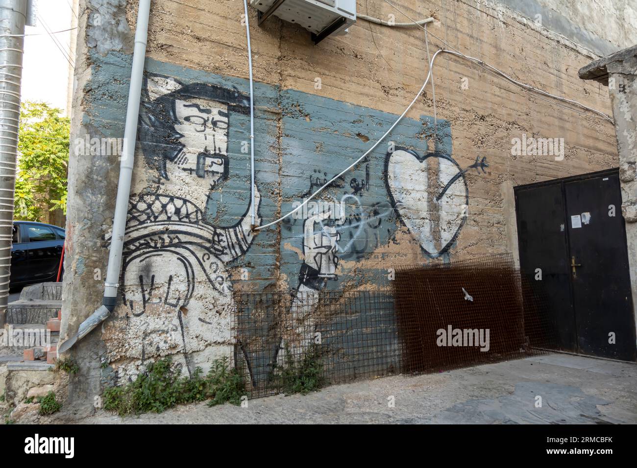 Street art in Amman, graffiti depicting graffiti artist in Amman Jordan ...