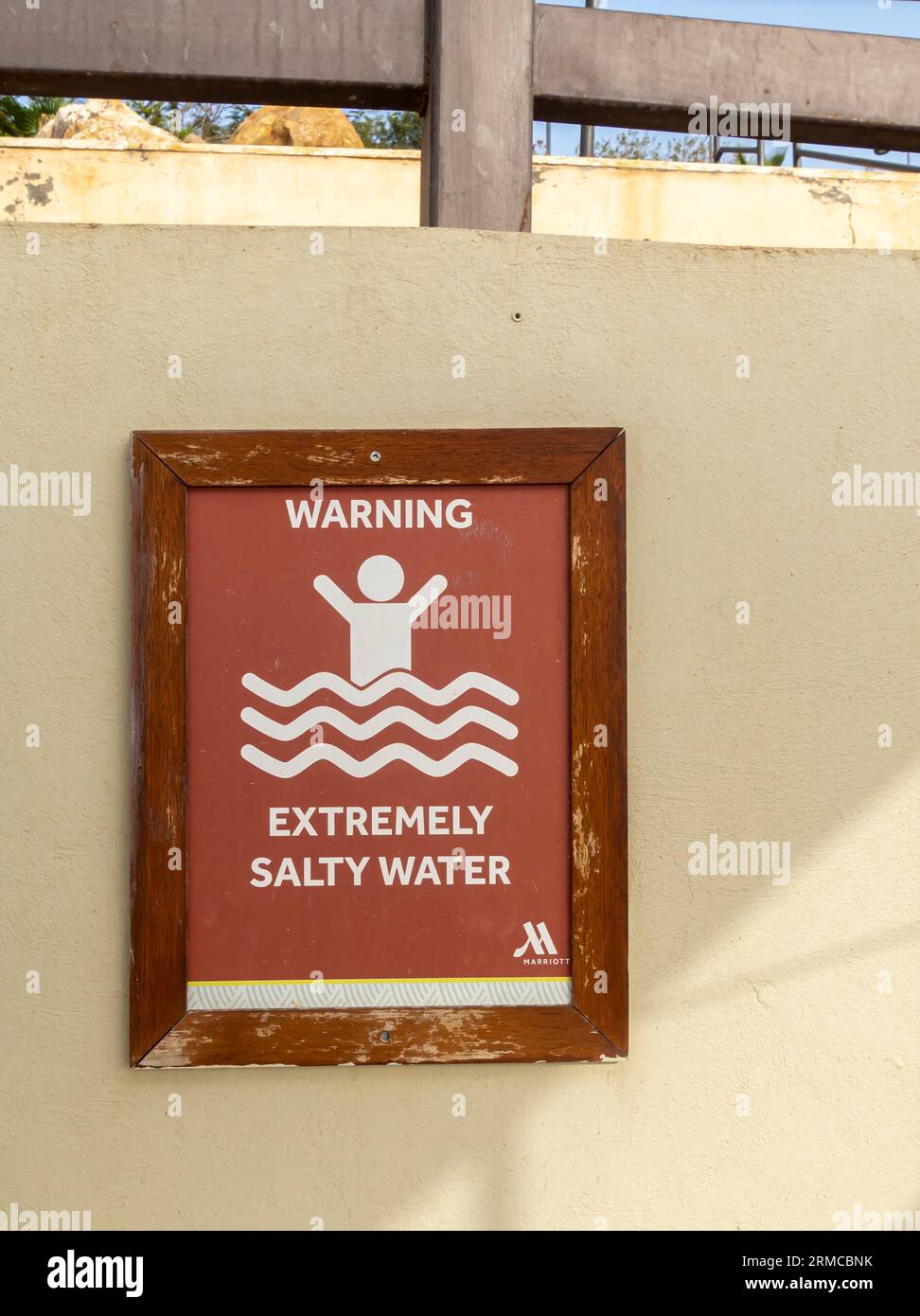 Warning Extremely salty water sign on Dead Sea Jordan beach Stock Photo ...