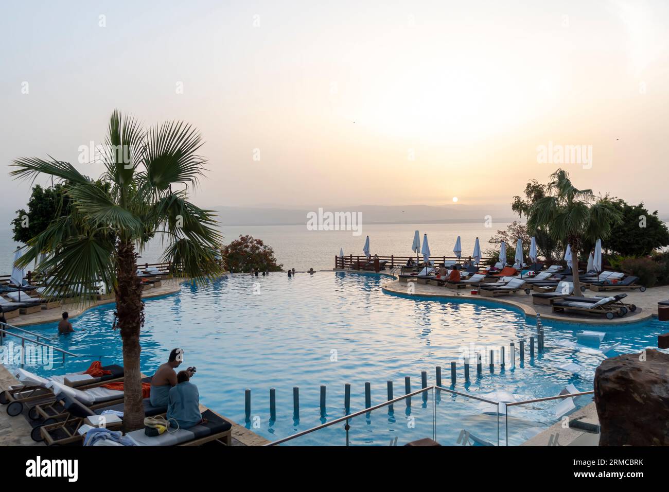 Jordan resort tourism. View of Dead Sea in Jordan. Swimming pool at ...