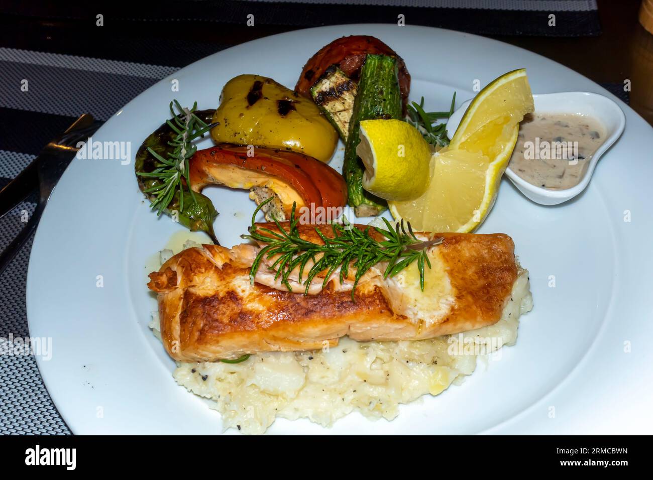 Grilled salmon with lemon served in Marriott Petra Aretas restaurant ...