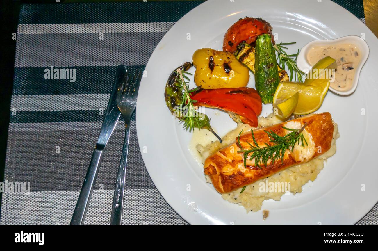 Grilled salmon with lemon served in Marriott Petra Aretas restaurant ...