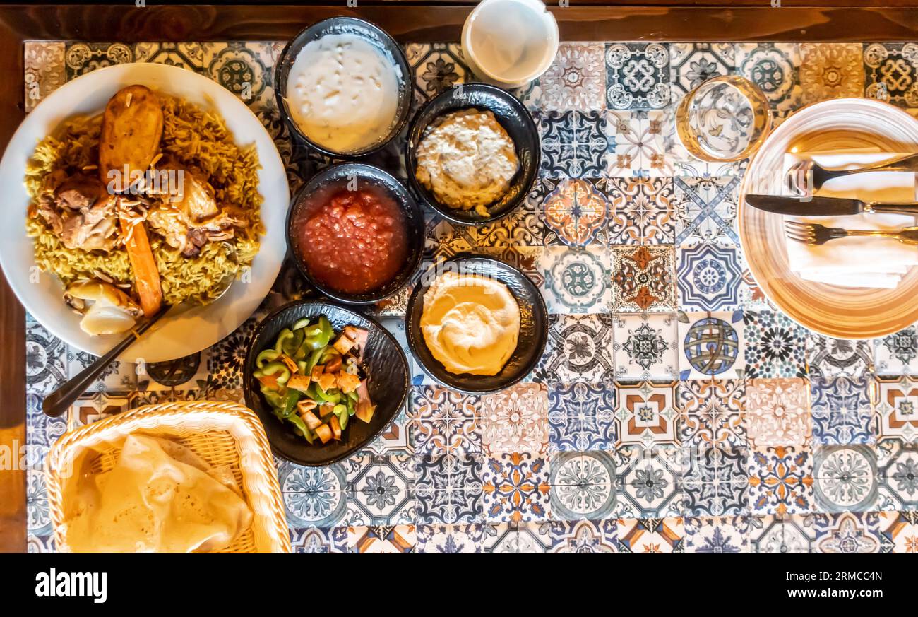 Mandi lamb with rice - Jordanian dish on the table. Nabataean Tent ...