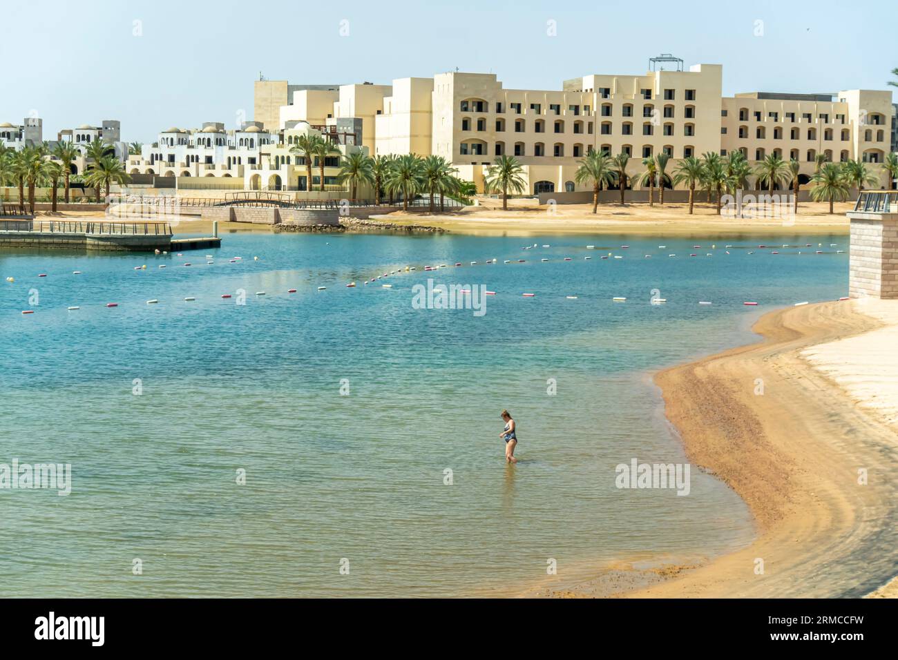 Tourists woman in the pool in the resort lagoon pool in Jordan Middle ...