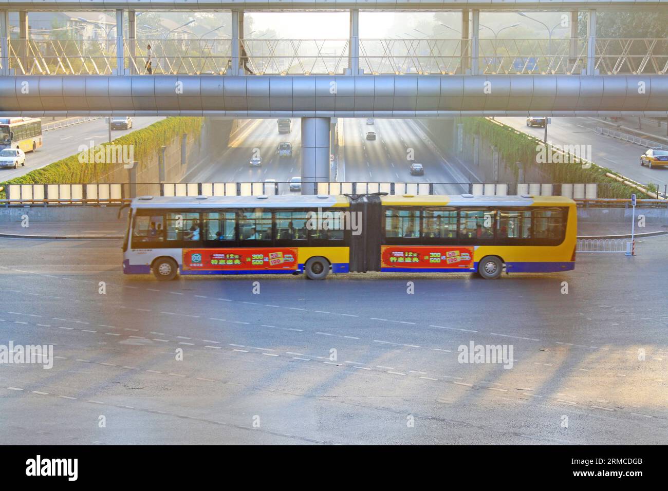 busy traffic flow in a modern city in the morning, in Beijing, China ...