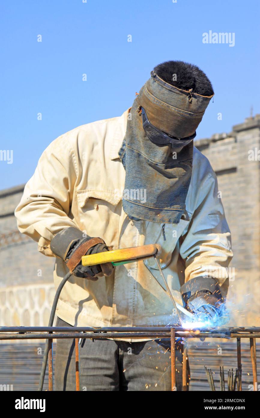 professional worker welding operation in construction industry, china ...