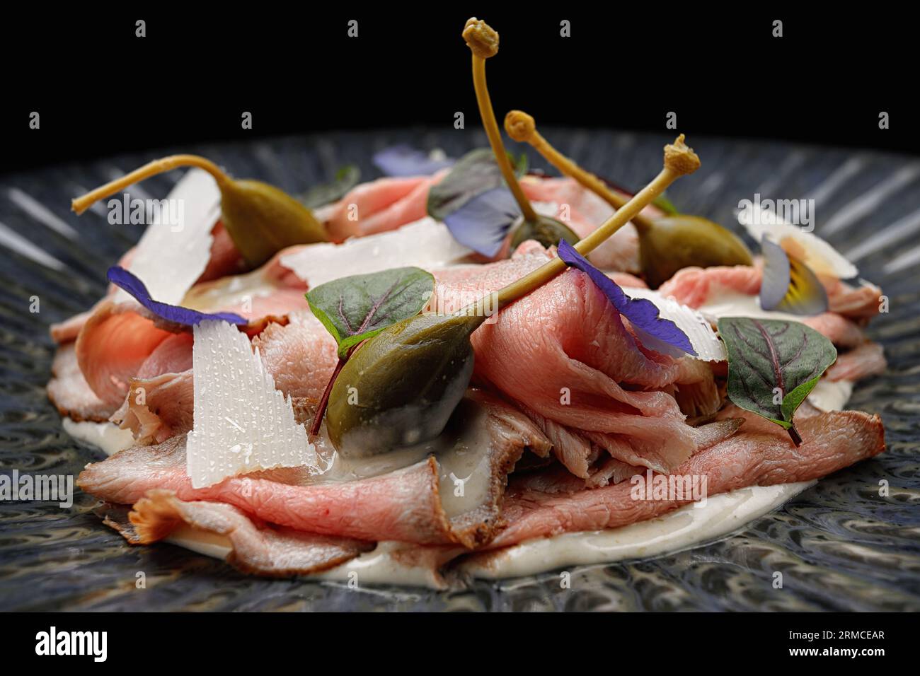 italian cold dish: vitello tonnato with cheese, capers, and sauce Stock ...