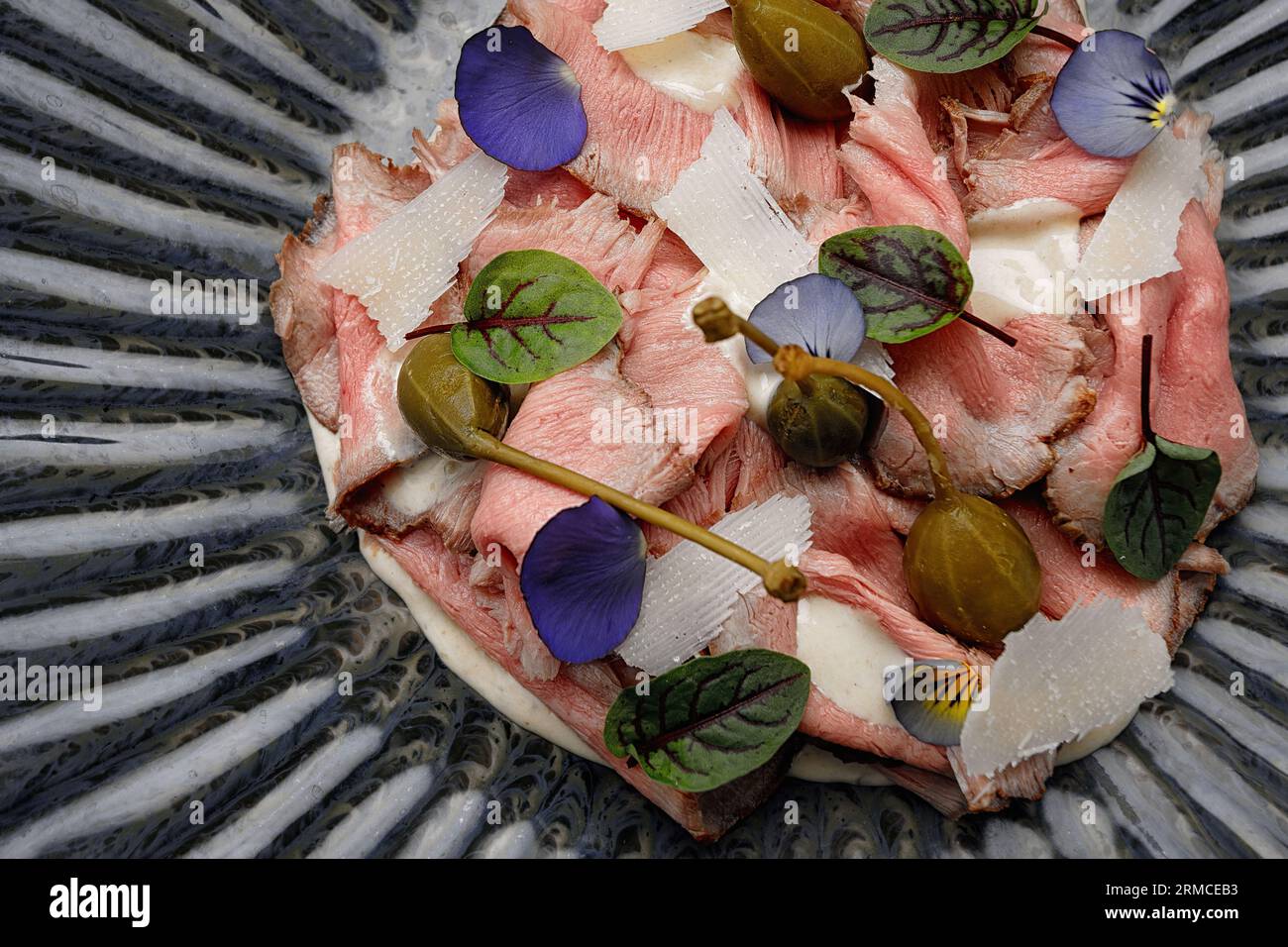 italian cold dish: vitello tonnato with cheese, capers, and sauce Stock ...