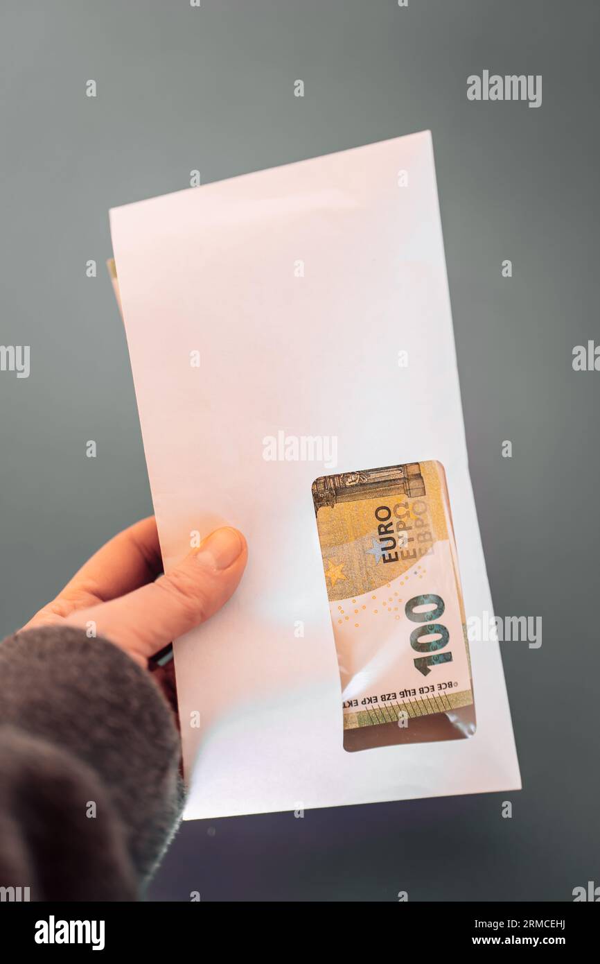 Envelope money hand sorting hi-res stock photography and images - Alamy