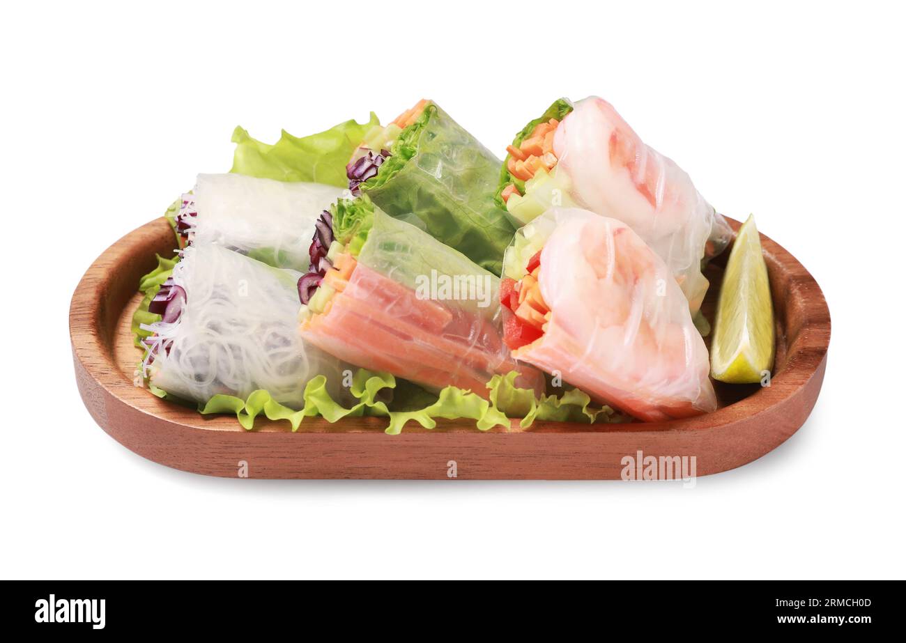 Tasty spring rolls served with lime on white background Stock Photo - Alamy