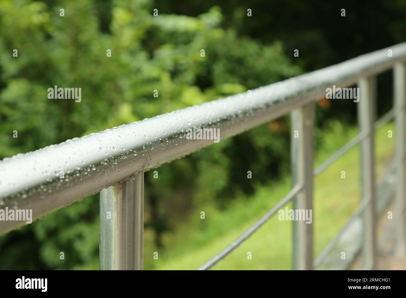 Metal railing with rain drops hi-res stock photography and images - Alamy