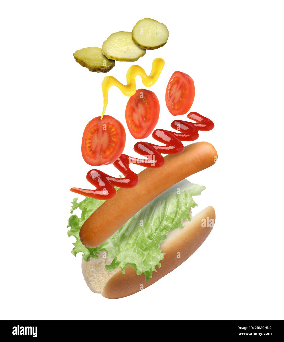 Hot dog ingredients in air on white background Stock Photo - Alamy