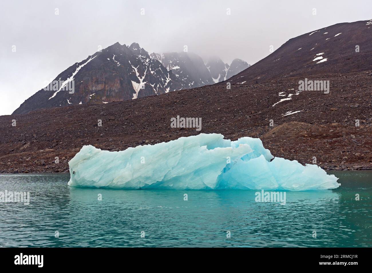 Lonely Iceberg on a Barren Arctic Shore in the Svalbard Islands in ...