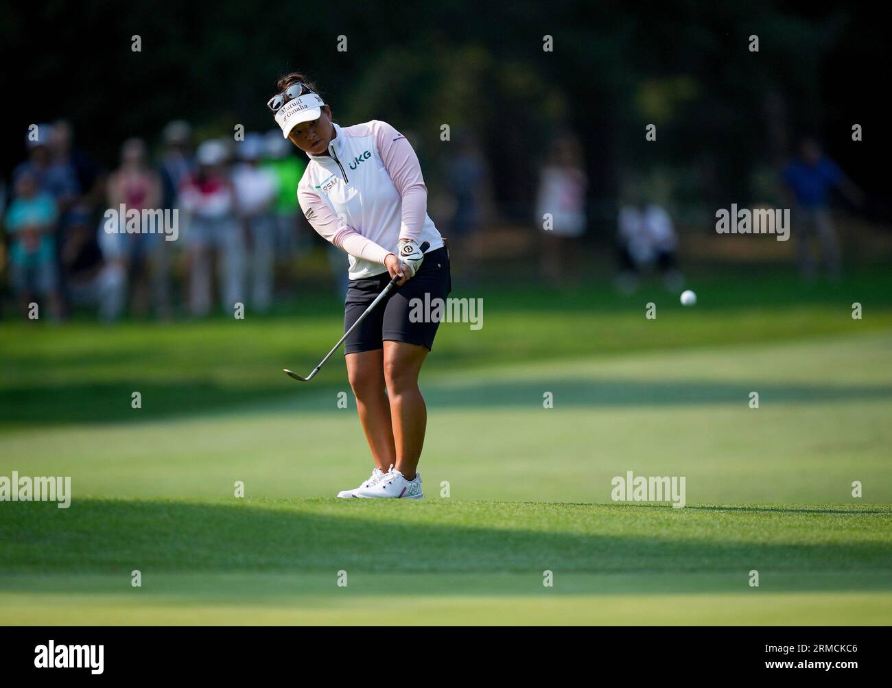 Megan Khang, of the U.S., chips onto the seventh green during the final ...