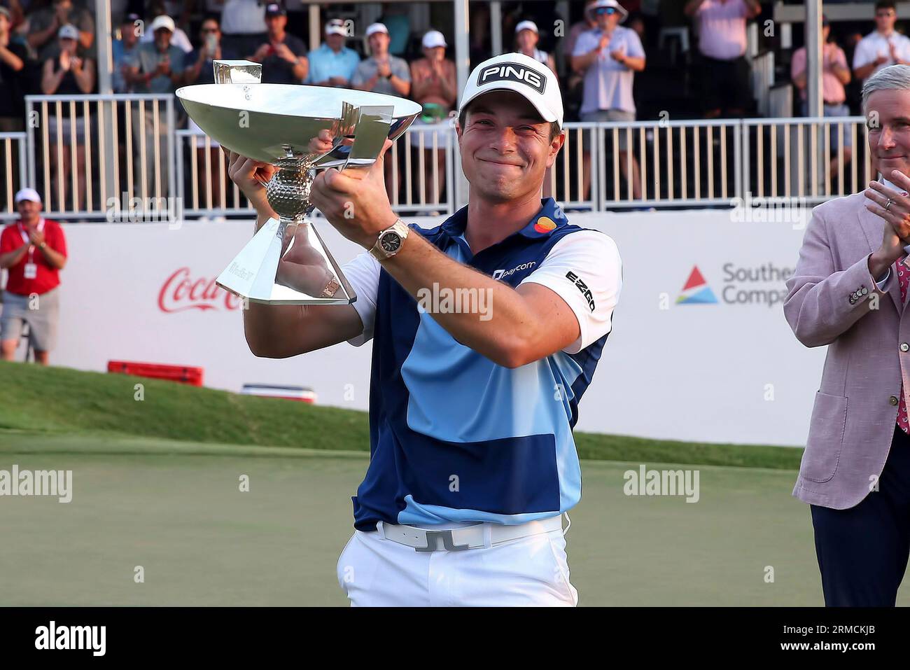 ATLANTA, GA - AUGUST 27: Viktor Hovland holds up the FedEx Cup trophy ...