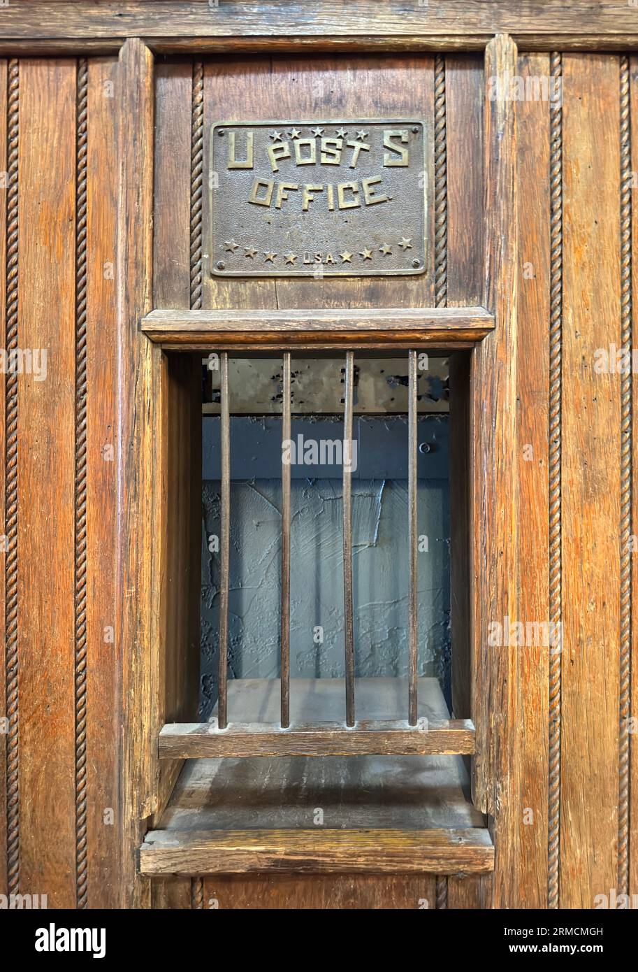 See old teller window at the US Post Office. Bars are at the window ...