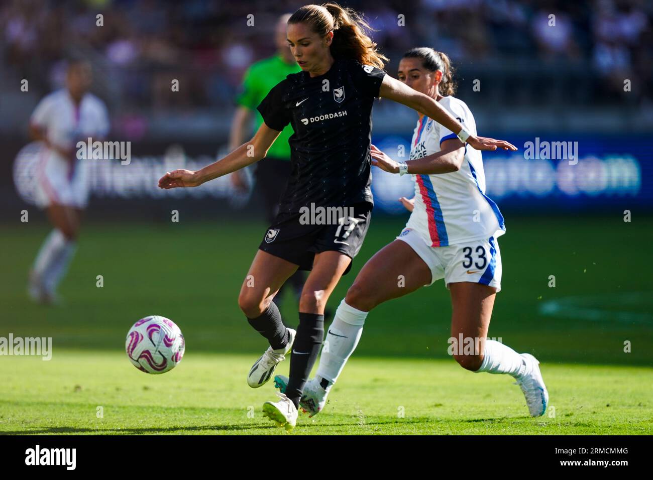 Angel City FC midfielder Dani Weatherholt (17) and OL Reign midfielder ...