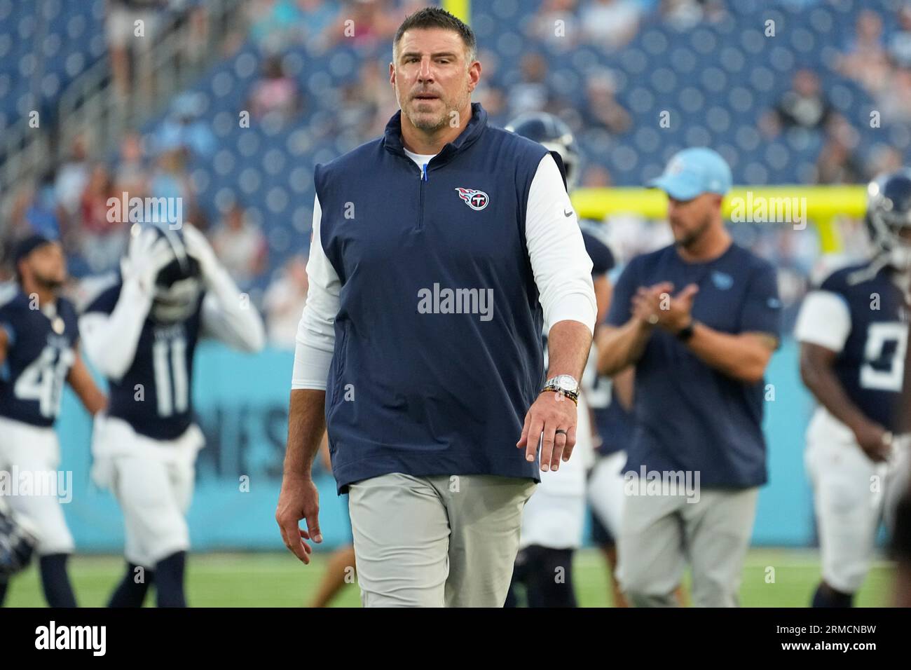 Tennessee Titans head coach Mike Vrabel walks across the field before ...