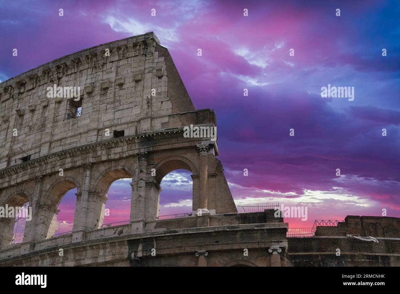 Evening image of the Roman Coliseum with a colorful evening sky Stock ...