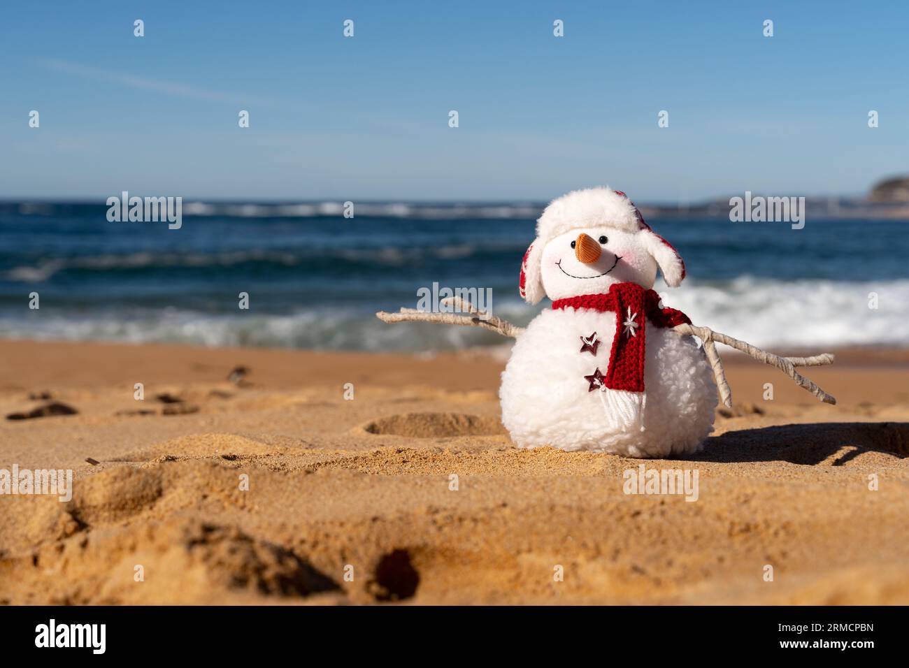 Snowman on the beach Stock Photo - Alamy