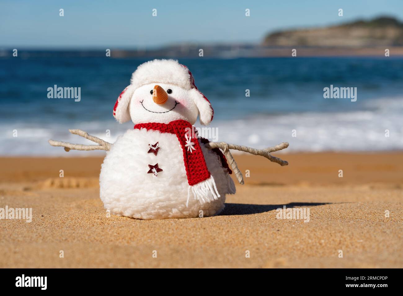 Snowman on the beach Stock Photo - Alamy
