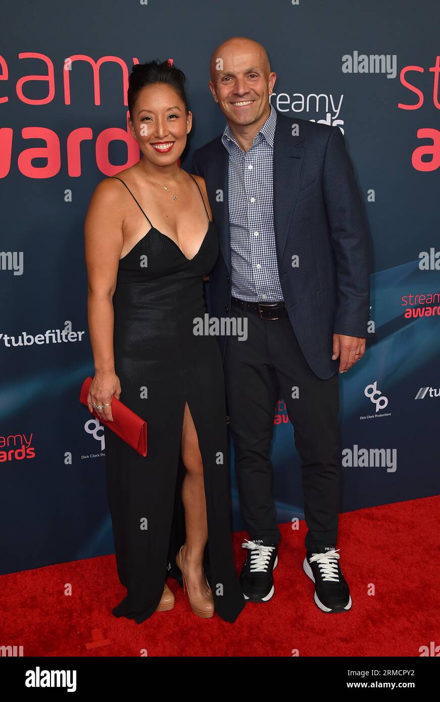 Joanne Lee Molinaro, left, and Anthony Molinaro arrive at the Streamy ...