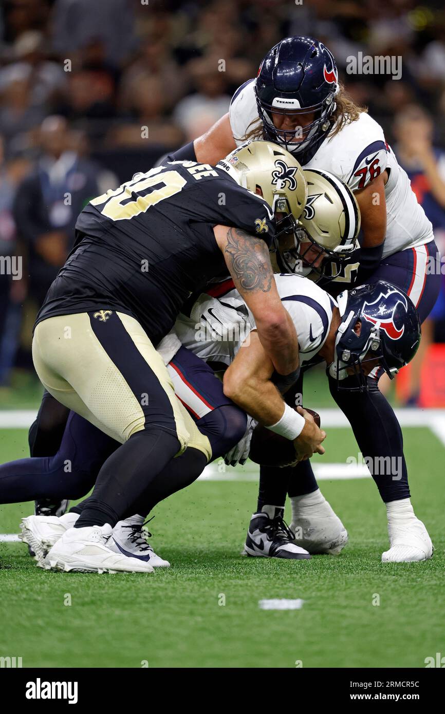 Houston Texans quarterback Davis Mills (10) is sacked by New Orleans ...