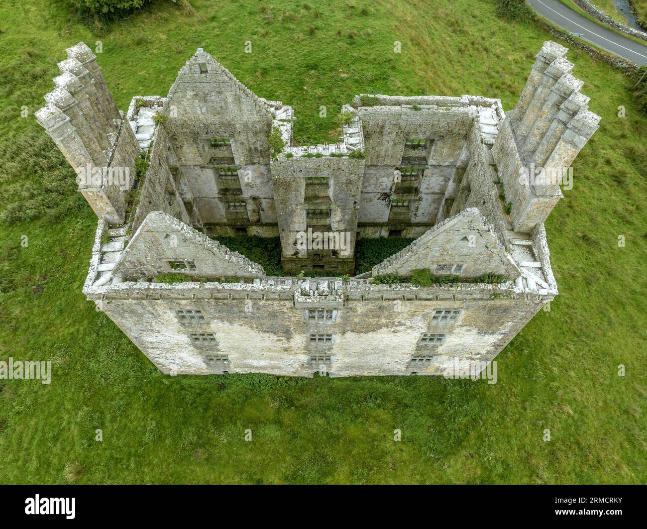 Aerial view of Glinsk castle medieval fortified tower house in Ireland ...