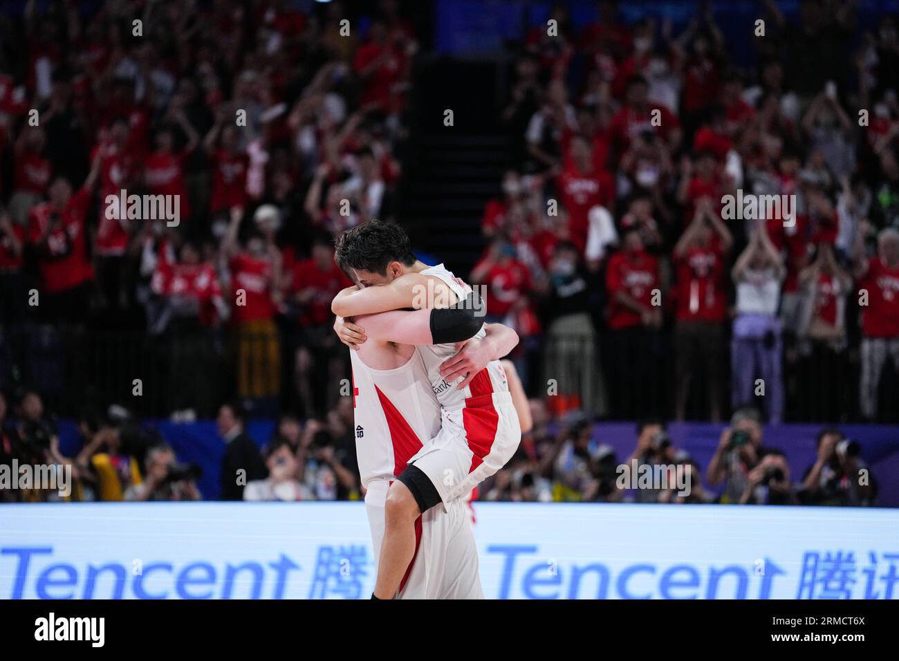 Okinawa, Japan. 27th Aug, 2023. Josh Hawkinson (L) of Japan celebrates ...