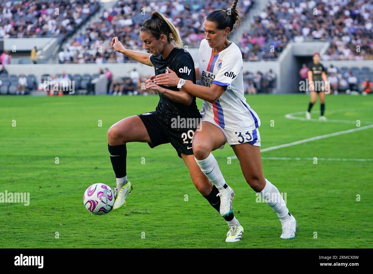 Angel City FC midfielder Clarisse Le Bihan (29) controls the ball as OL ...