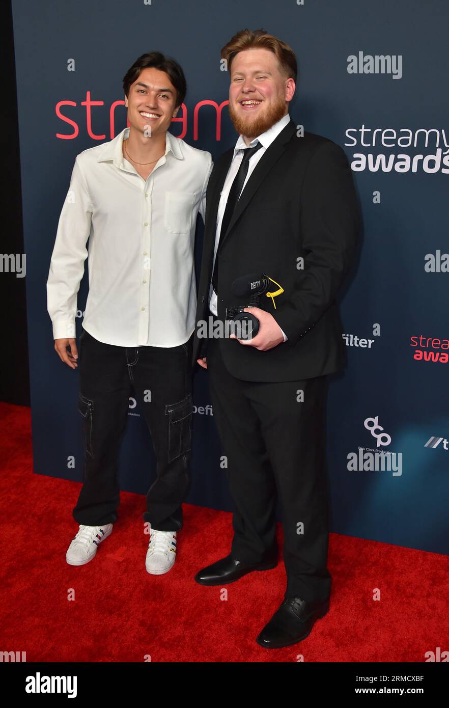 Kelly Wakasa, left, and Wyatt Dobson arrive at the Streamy Awards on ...